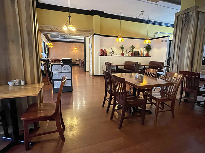 The dining room's warm tones and thoughtful layout create conversation nooks where breakfast philosophies can be debated and coffee can be savored.