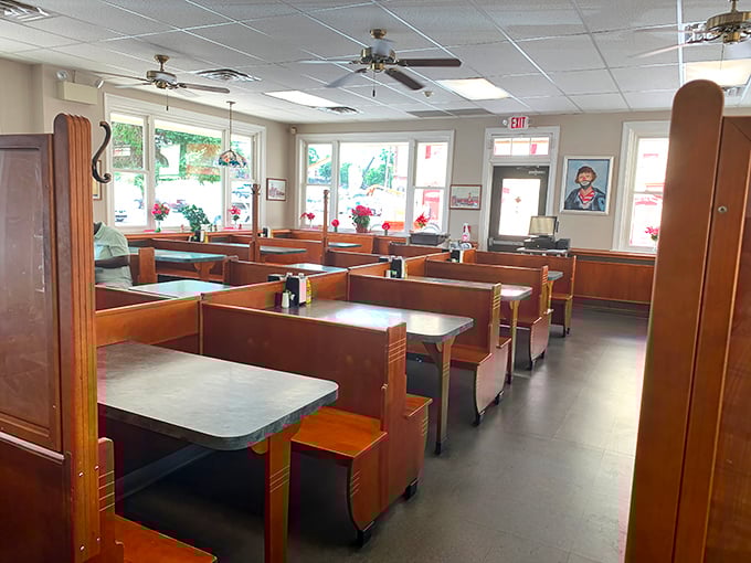 Empty booths waiting for hungry patrons like a scene from an Edward Hopper painting, but with better food on the horizon.