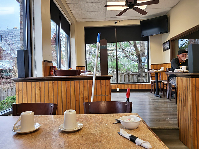 Large windows flood the dining area with natural light, creating the perfect backdrop for comfort food and catching up with old friends.