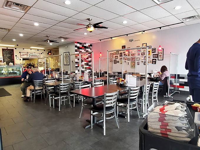 The dining room balances cozy and spacious. Those black and red accents aren't just design choices&mdash;they're setting the stage for serious eating.