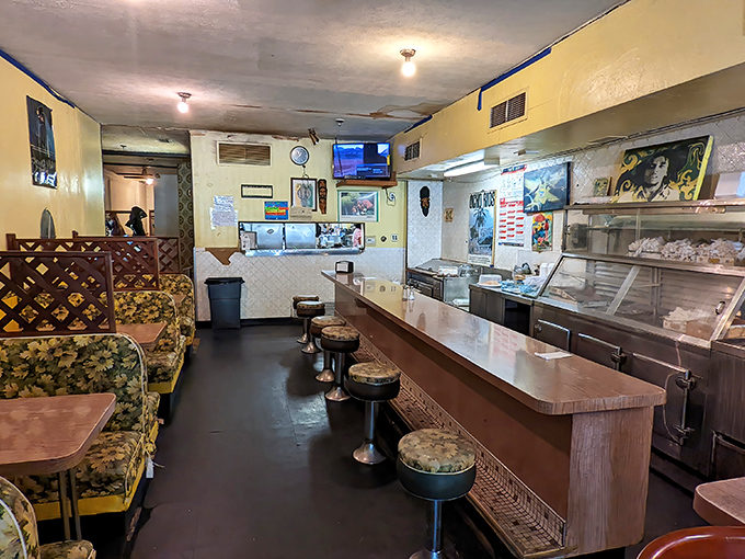 The counter service setup might be simple, but it's the culinary equivalent of front-row seats to a Caribbean flavor concert.