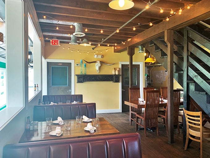 Warm wooden beams, string lights, and cozy booths create the perfect backdrop for making memories over margaritas and mole.