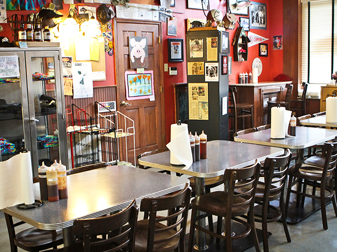 The red walls and memorabilia create an atmosphere where calories don't count and diet plans come to die a delicious, sauce-covered death.