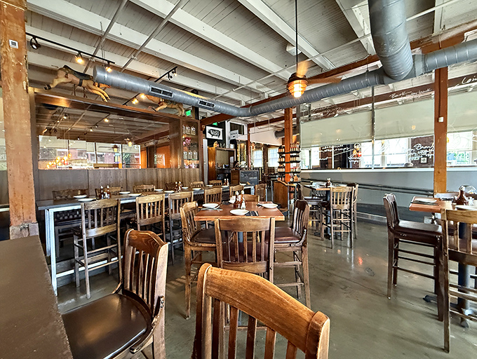 Where barbecue dreams come true. The warm wood tones and industrial touches create a space that's both sophisticated and down-home comfortable.