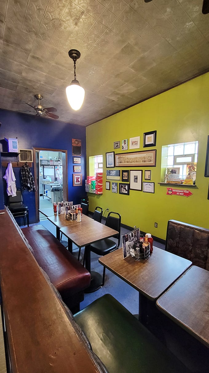 Vibrant lime-green walls adorned with framed memories tell stories of Kenosha's past while you create new ones over coffee.