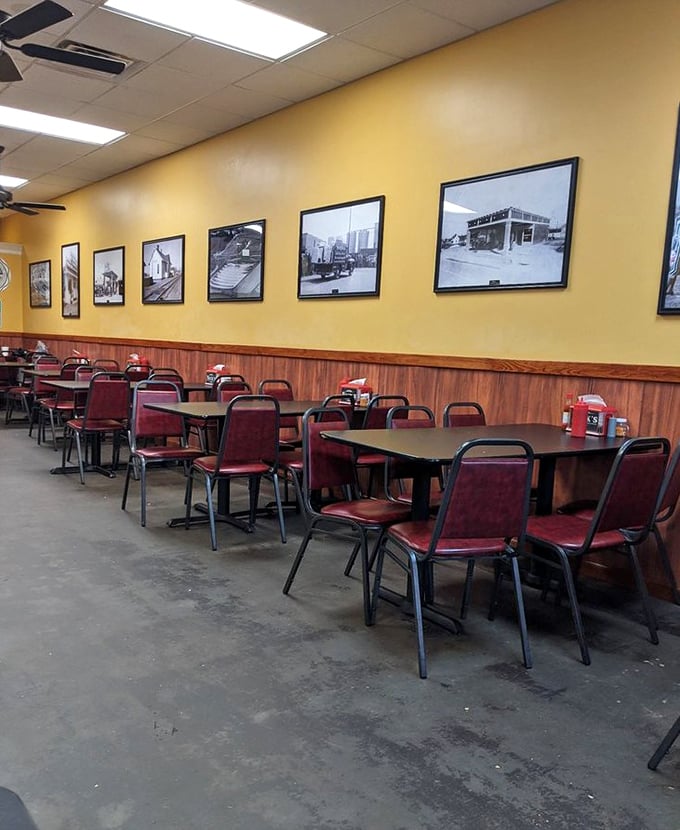Yellow walls adorned with local history &ndash; a dining room that feels more like your favorite uncle's den than a restaurant.