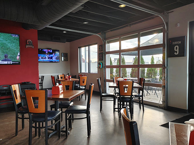 The garage door windows blend indoor comfort with outdoor views, creating the perfect backdrop for serious barbecue contemplation.