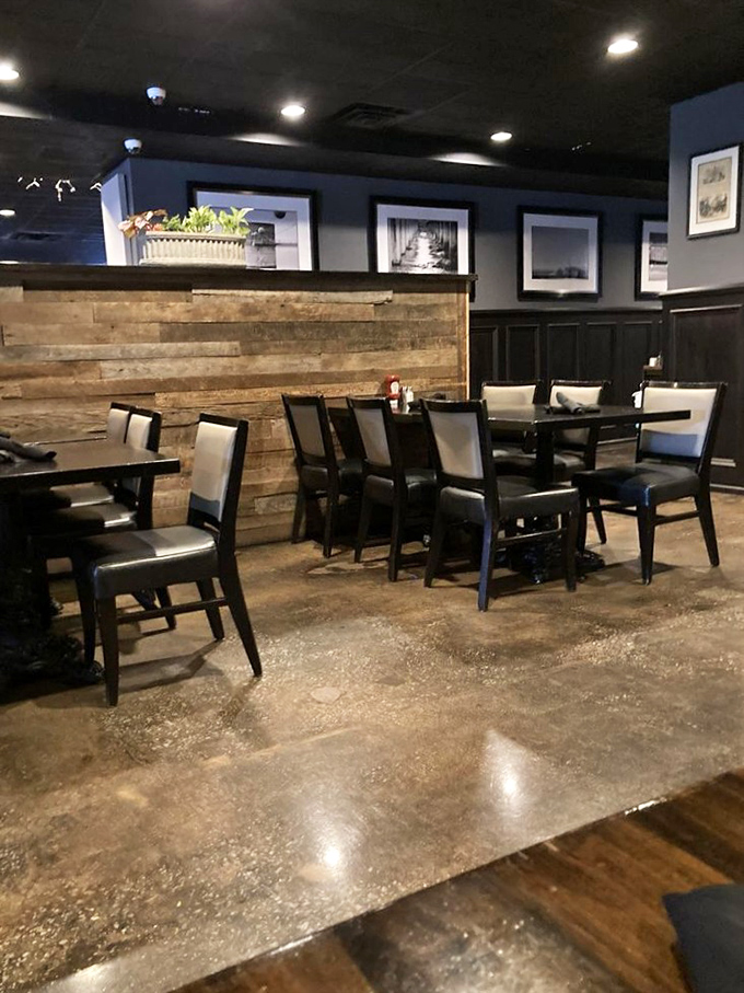 Cozy dining nooks separated by reclaimed wood dividers create intimate spaces for both first dates and thousandth dates.