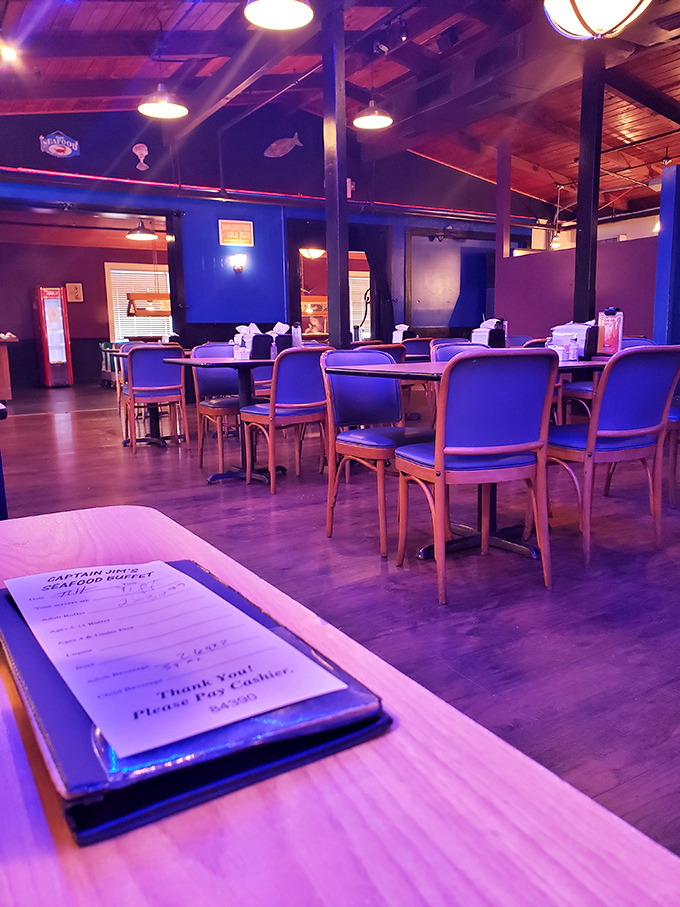 The blue chairs and wooden ceiling create a maritime dining hall where calories don't count and second trips are practically mandatory.