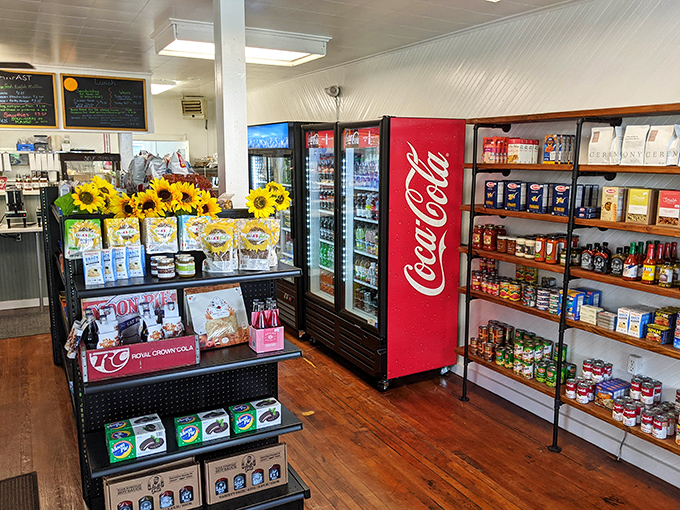 Sunflowers brighten the interior while refrigerators hum with possibilities. This isn't just shopping – it's a treasure hunt for your taste buds.