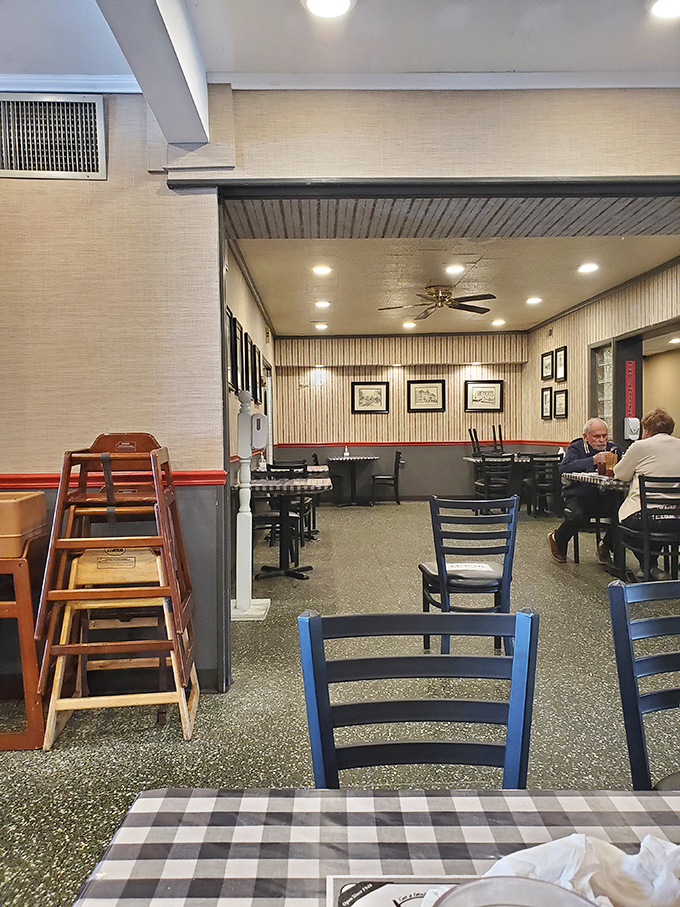 The dining room balances nostalgia with comfort. Those high-backed chairs have supported generations of Scranton residents through countless meals and conversations. 