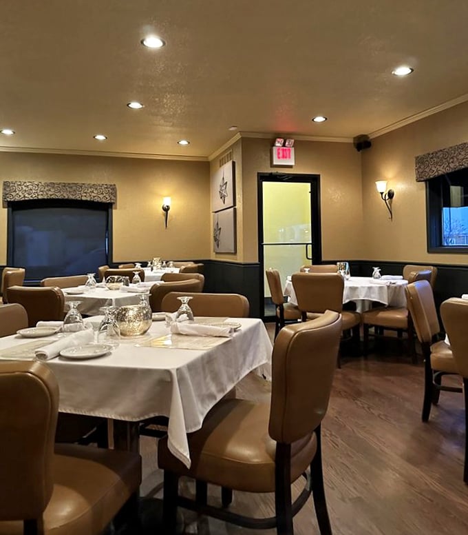 Elegant simplicity defines the dining room. Those tan leather chairs have cradled generations of happy diners through countless celebrations.