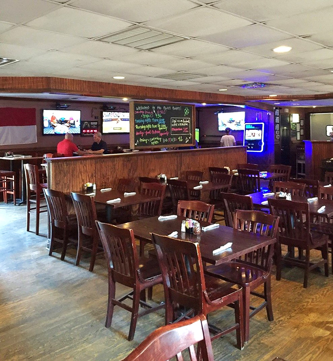 The dining room waits patiently for the dinner rush, like a theater before the show. Those wooden chairs have heard countless happy sighs.