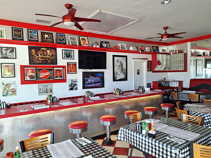 Red ceiling fans spinning lazily above checkered floors &ndash; it's like Happy Days met a really good breakfast spot.