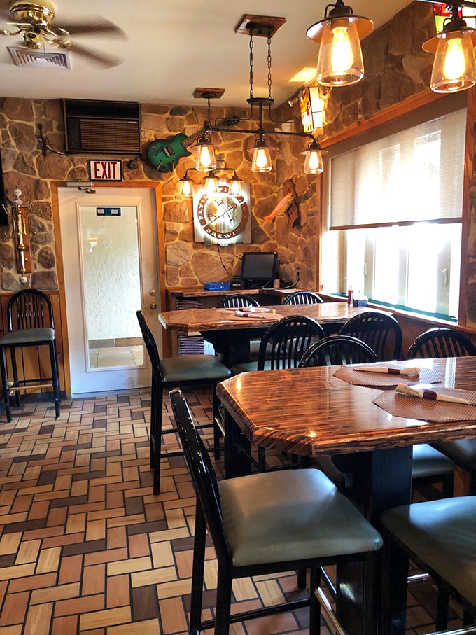 Warm lighting, stone walls, and wooden tables create that "I've discovered something special" feeling that makes dinner an event.