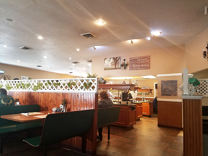 The dining room's warm wood paneling and lattice dividers create cozy nooks for savoring both the food and the company.