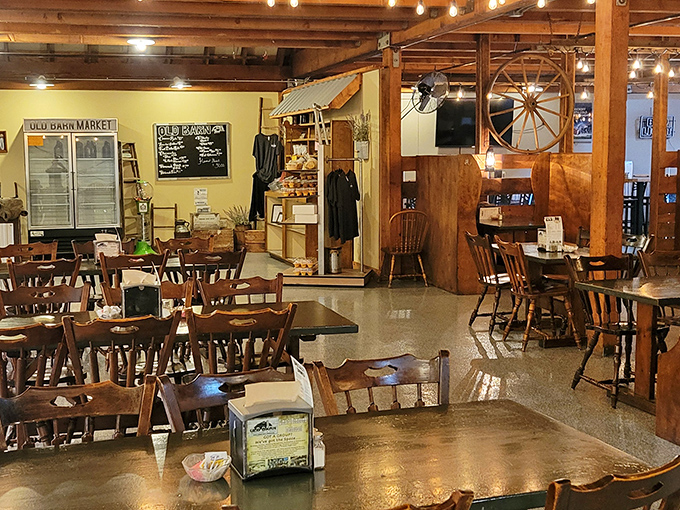 Wagon wheels and wooden accents remind you that this dining room was once home to hay and horses, not hungry humans seeking comfort food.
