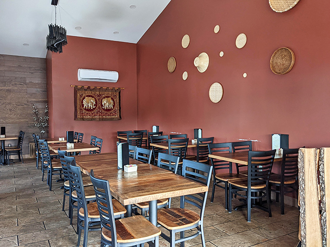 The terracotta walls adorned with handcrafted baskets create a dining room that feels both exotic and homey&mdash;like visiting a friend's place in Chiang Mai.