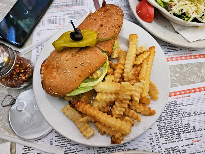 A sandwich that requires both hands and a strategy. Crispy fries, pickle spear, and a sub that's been feeding hungry Akronites for decades.