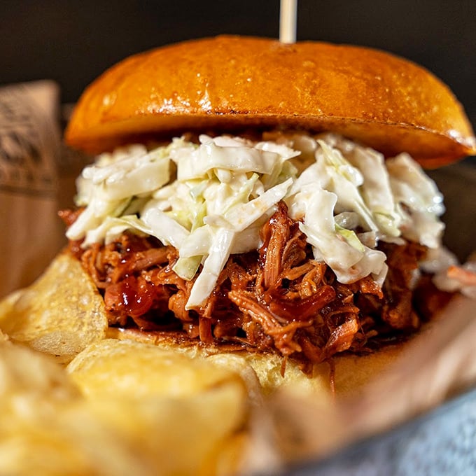 This pulled pork sandwich isn't just comfort food&mdash;it's a hug on a bun with coleslaw standing by for moral support.