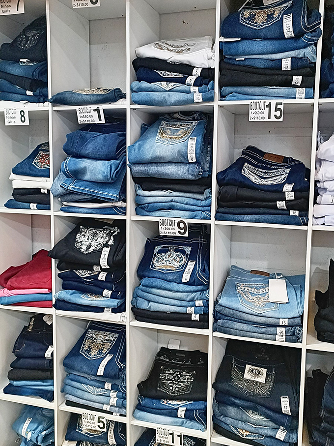 Denim heaven organized by size and style. These jeans have seen more reorganizing than my Netflix watchlist after a recommendation algorithm update.