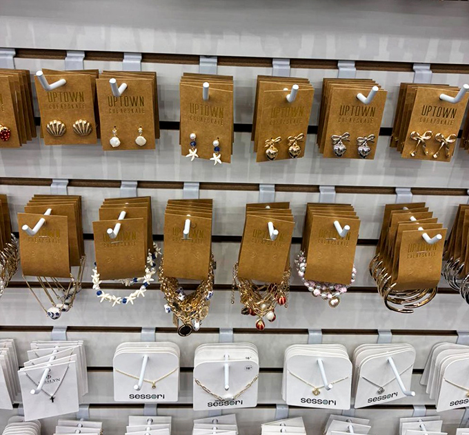 Delicate earrings and necklaces displayed with boutique-worthy care. Jewelry that whispers "designer" but shouts "deal!"