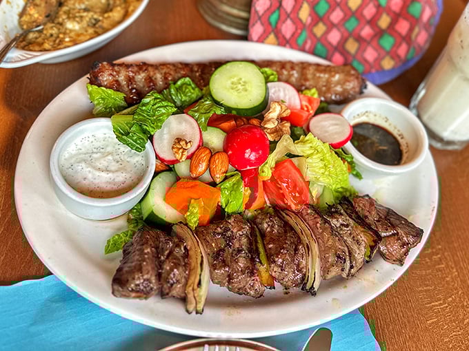 Kabab Bareh presents itself with the confidence of a dish that knows it's about to rock your world.