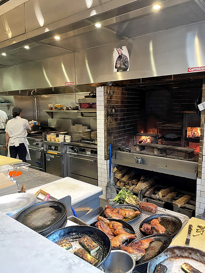 That wood-fired hearth isn't just equipment&mdash;it's the restaurant's beating heart. Watch as flames lick the edges of whatever's about to become your dinner.