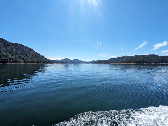 The boat ride across Shasta's crystal waters is merely the appetizer to the geological feast awaiting on the other side.