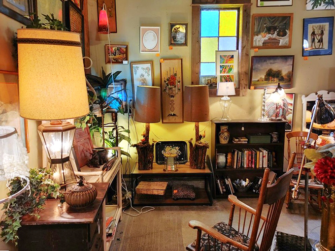 This cozy vignette could be the set for the world's most interesting talk show, complete with vintage lamps and art that tells stories.