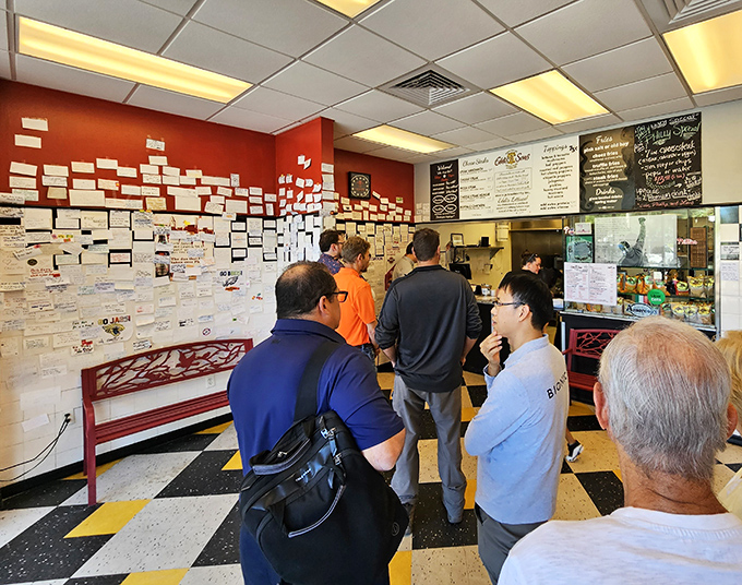 The lunchtime pilgrimage to cheesesteak nirvana &ndash; these folks know that good things come to those who wait, especially when it's this good.