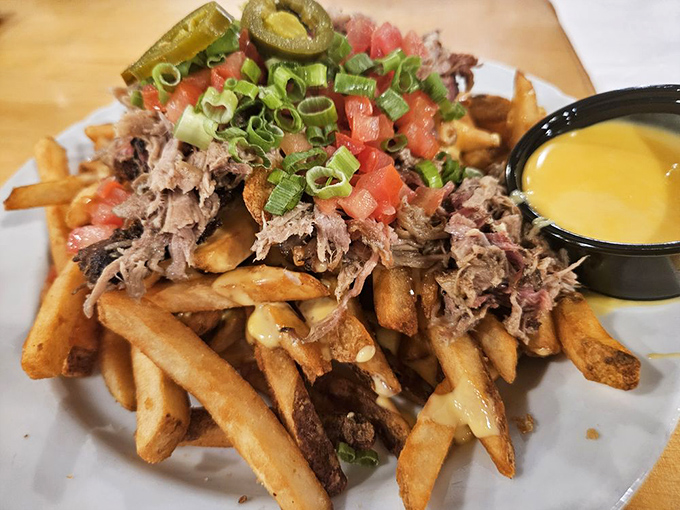These aren't just fries&mdash;they're a foundation for pulled pork, jalape&ntilde;os, and cheese sauce in a dish that demands both hands and napkins.
