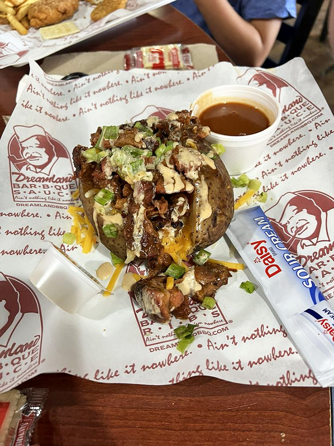 This loaded potato didn't just graduate from toppings school – it was the valedictorian with honors in excess and deliciousness.