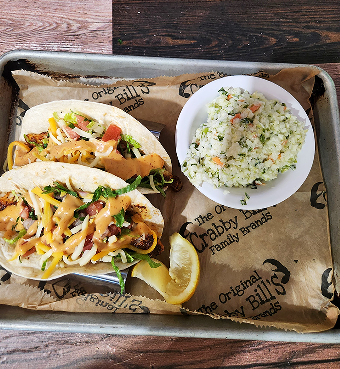 Fish tacos dressed to impress, with a side of coleslaw that isn't an afterthought but a worthy companion to the main attraction.