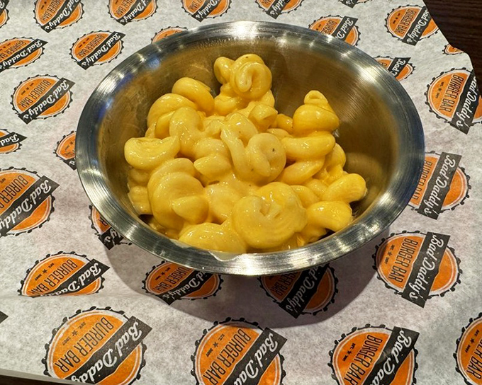 Mac and cheese so gloriously golden and gooey it could make a grown adult weep with nostalgic joy. Childhood comfort with a grown-up execution.