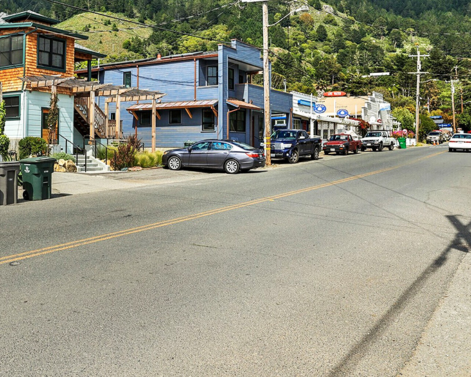 A street where parking is still possible and buildings remember when Jefferson Airplane was just getting started.