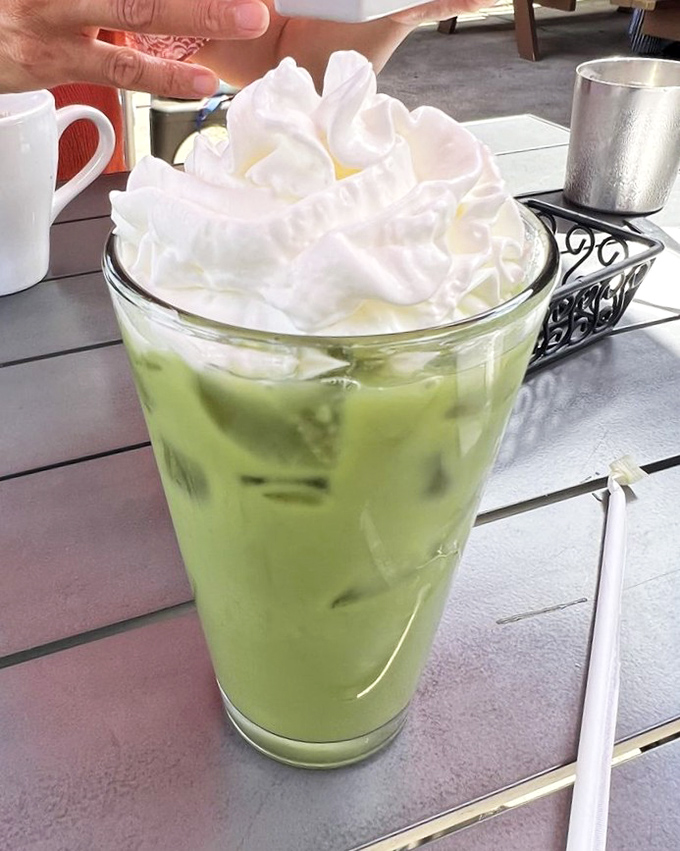 This matcha melon tea topped with clouds of whipped cream isn't just a drink &ndash; it's what summer would look like if it took liquid form.