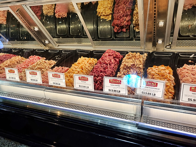 The deli case—where dreams are stored at proper temperature. A rainbow of protein possibilities awaits the hungry and decisive.