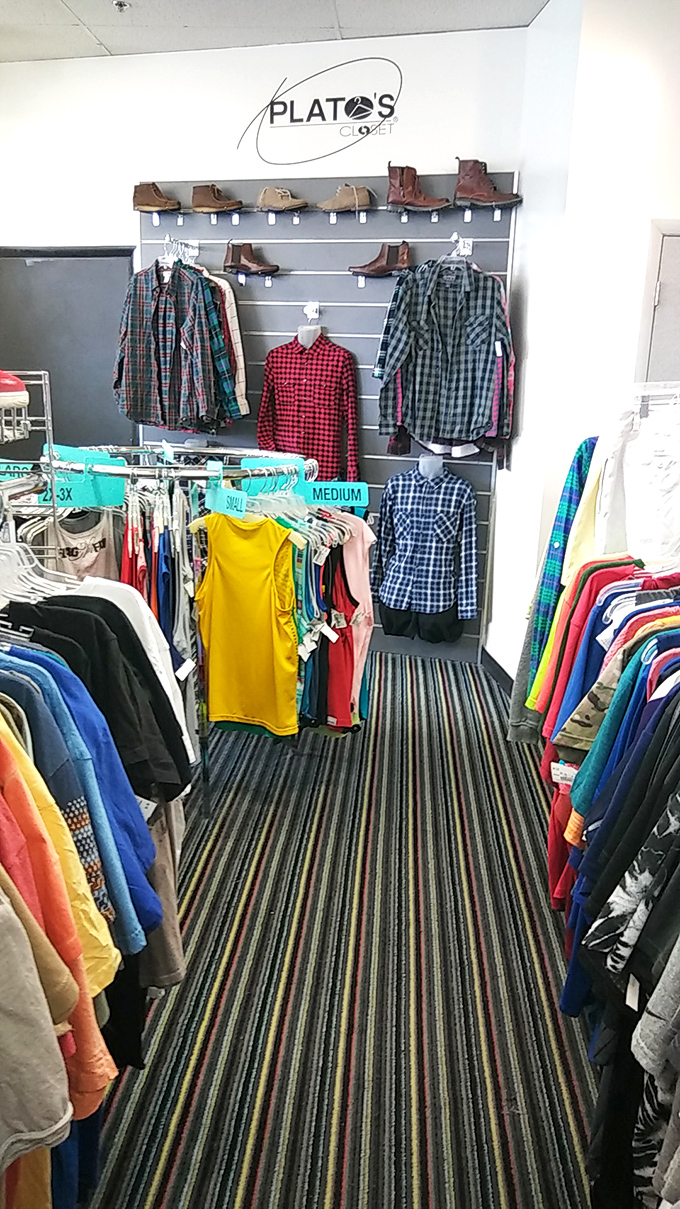 The men's section defies thrift store stereotypes with organized displays of button-downs, tees, and casual wear for every occasion.