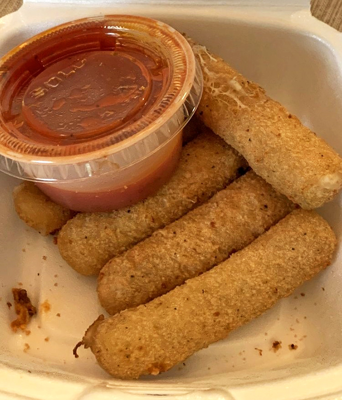 Golden-brown, perfectly crisp mozzarella sticks&mdash;the universal language of appetizer love. That marinara sauce is ready for its dipping destiny.