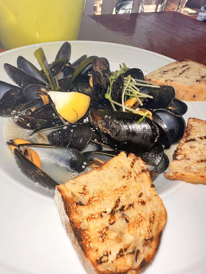These mussels aren't just steamed, they're transformed. The toasted bread isn't a side&mdash;it's the perfect tool for soaking up that heavenly broth.