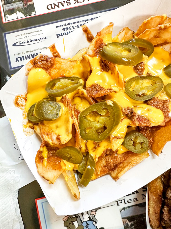 Nachos loaded with enough toppings to feed a small army or one very determined teenager.