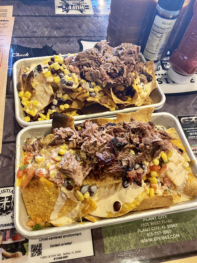 Nachos that laugh in the face of restraint&mdash;a mountain of chips, cheese, beans, and pulled pork that requires strategy and commitment.