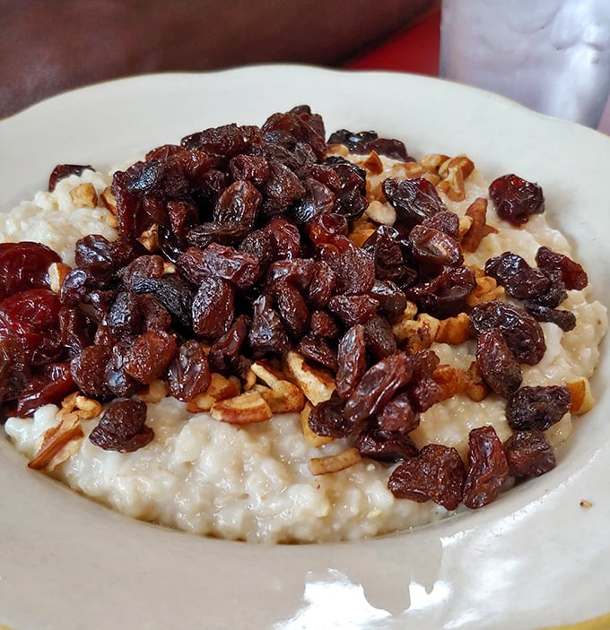 Oatmeal Supreme that's having an identity crisis as a dessert—topped with raisins, nuts, and enough goodness to make you forget it's actually good for you.