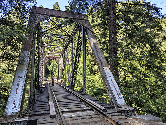 Not all who wander are lost, but crossing this vintage railroad trestle definitely feels like an adventure from another era.