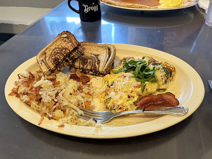 An omelet should be a canvas for creativity, and this one&mdash;dotted with fresh green onions&mdash;is practically breakfast Picasso.