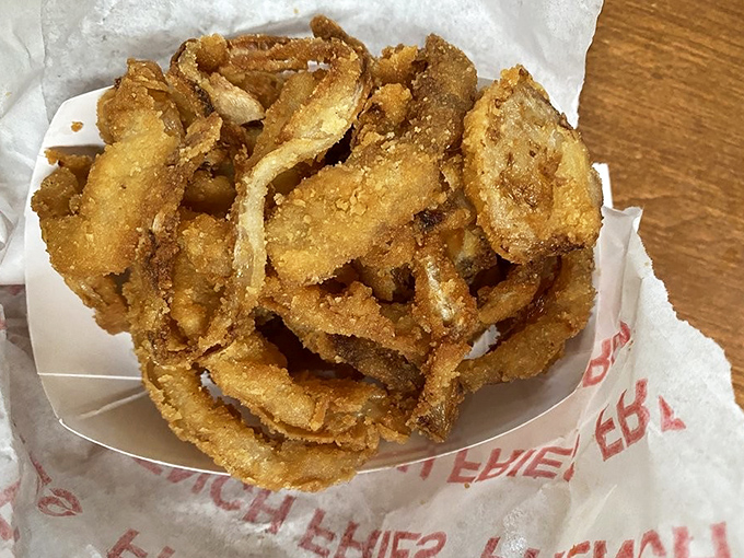 Onion rings should be an Olympic sport, and The Spot would bring home gold with these crispy, golden halos of happiness.