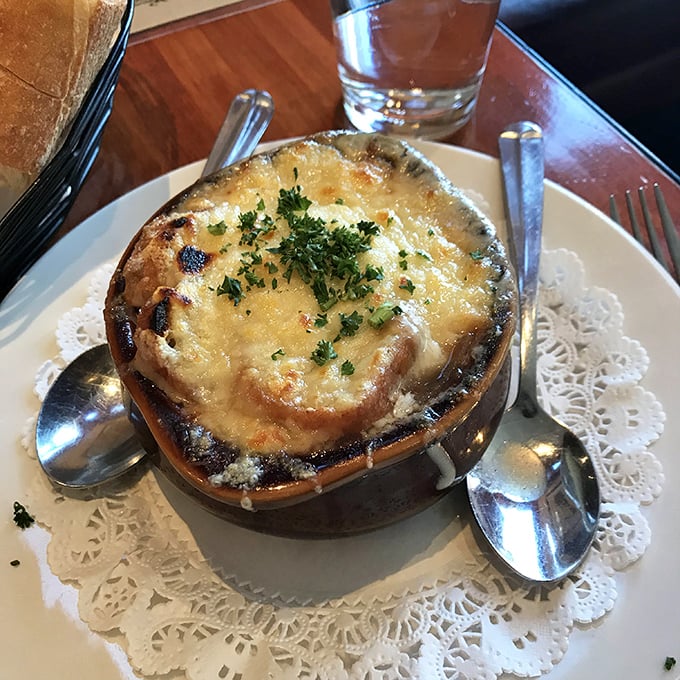 French onion soup with a cheese cap so perfect it deserves its own Instagram account. Spoon-breaking satisfaction guaranteed.