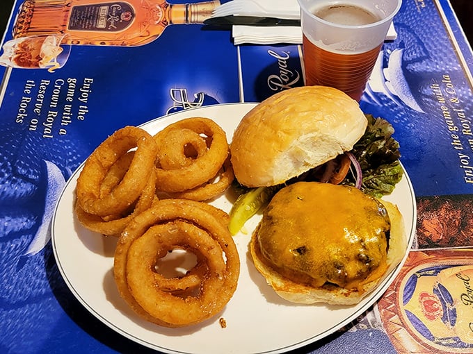 A burger with a side of onion rings is like Sinatra with a good bourbon—a classic pairing that never goes out of style.