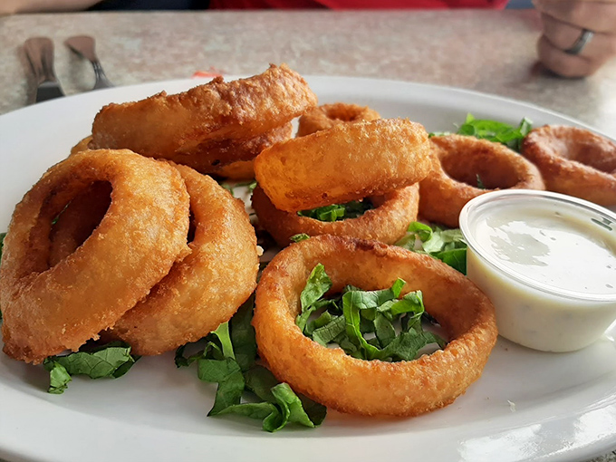 Onion rings with the perfect crunch-to-give ratio&mdash;the kind that make you wonder why anyone bothers with fancy appetizers when perfection is this simple.